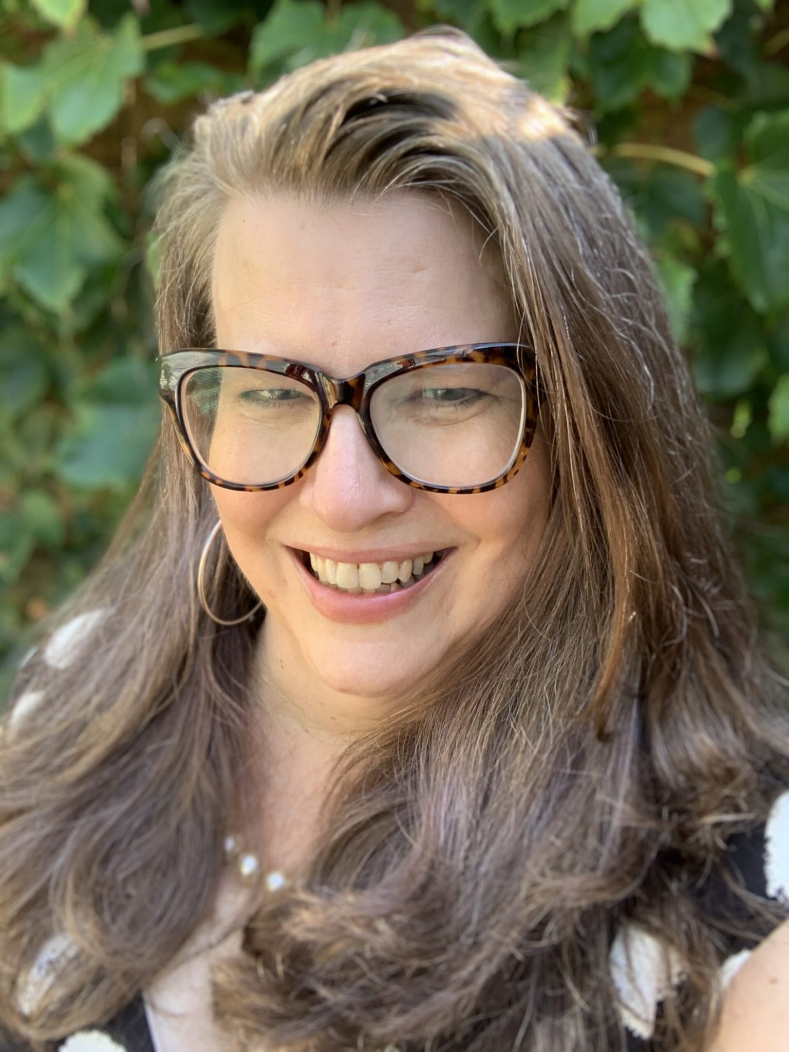 Emily L. Hauser - The Conversationalist